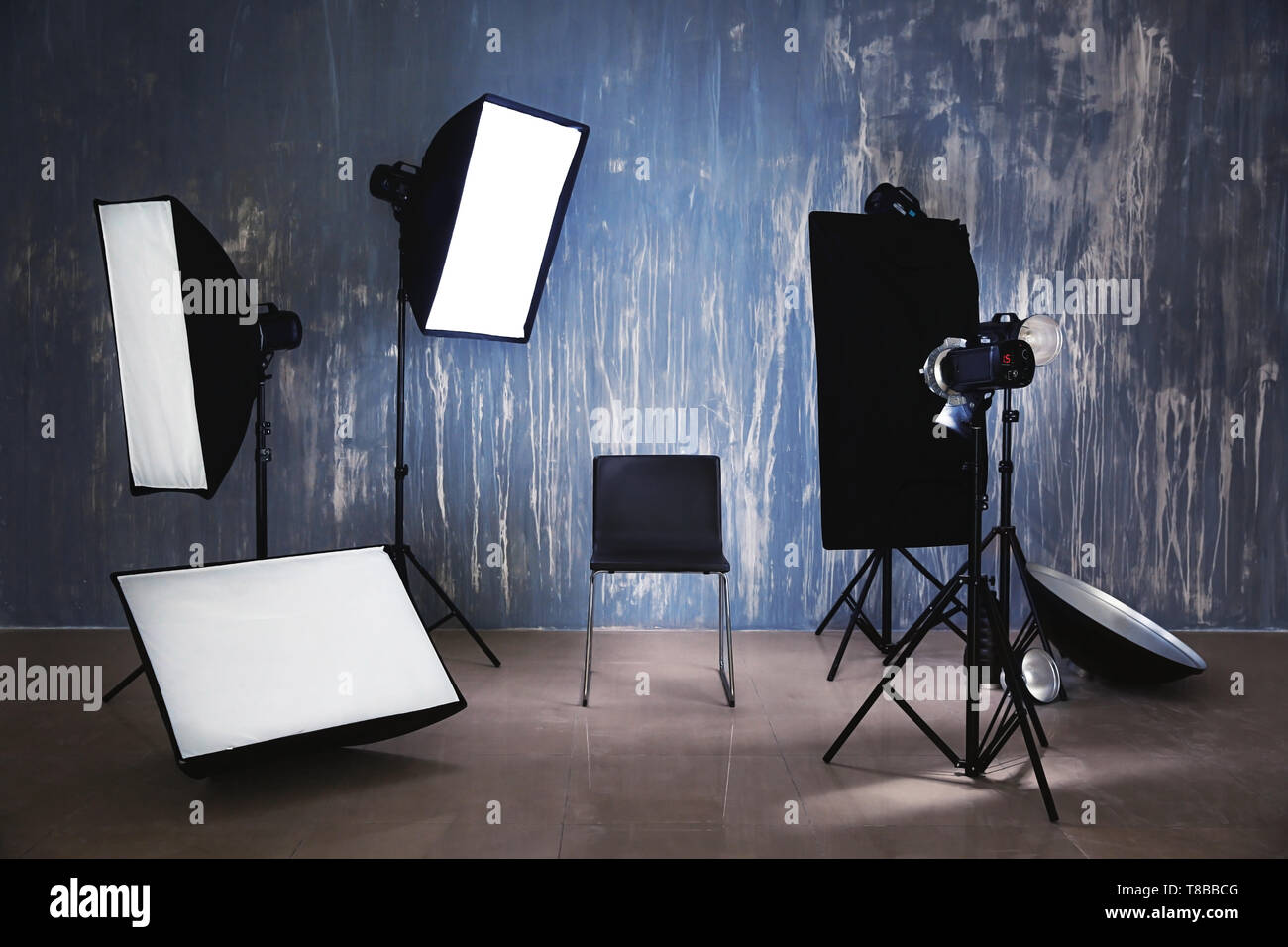 Modern chair in photo studio with professional equipment Stock Photo ...