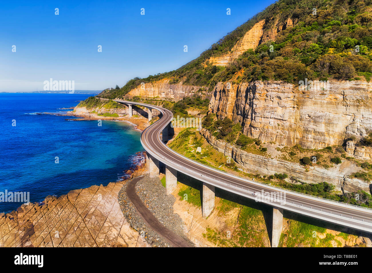 Sea cliff bridge section of the Grand Pacific drive around steep ...