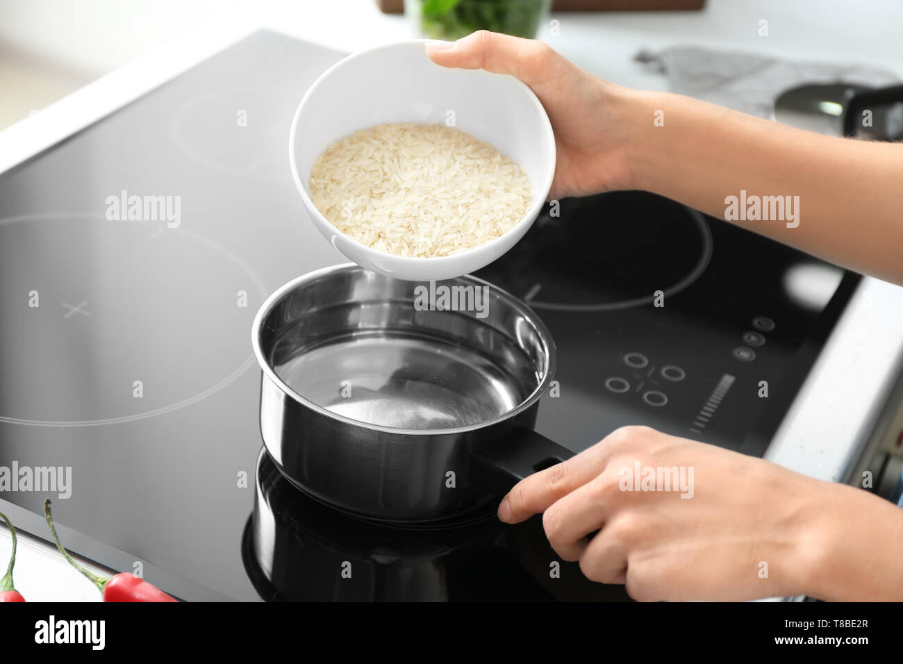 Closeup rice in boiling water hi-res stock photography and images - Alamy
