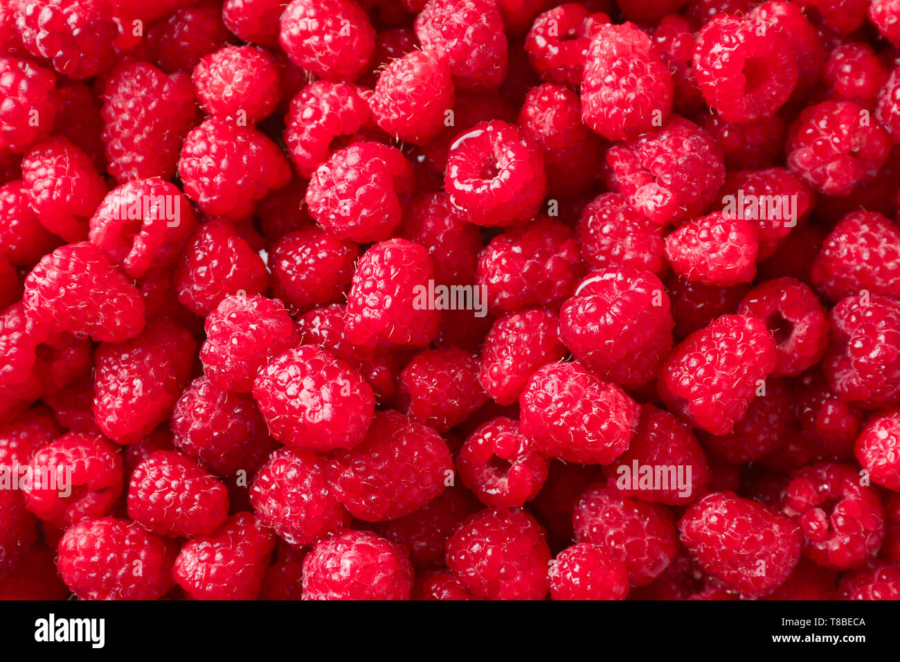 Fresh ripe raspberries as background Stock Photo - Alamy