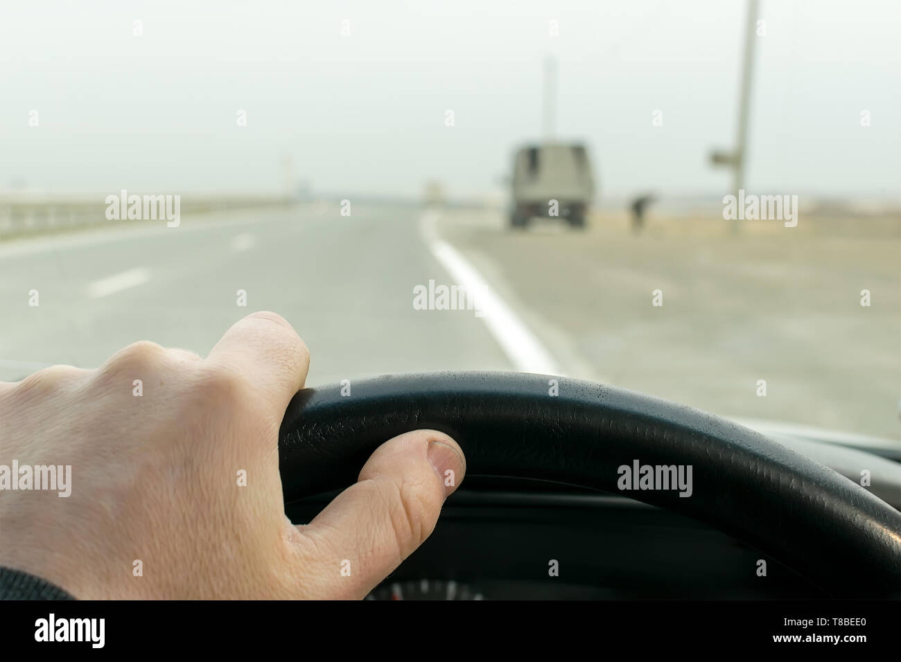 Drivers hand holding steering wheel hi-res stock photography and images ...