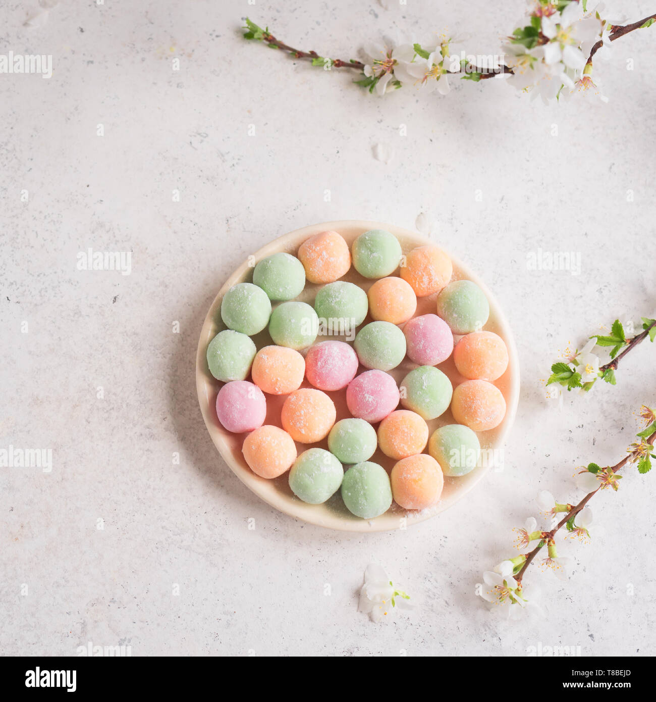 Mini Mochi - traditional japanese dessert on white table, top view ...