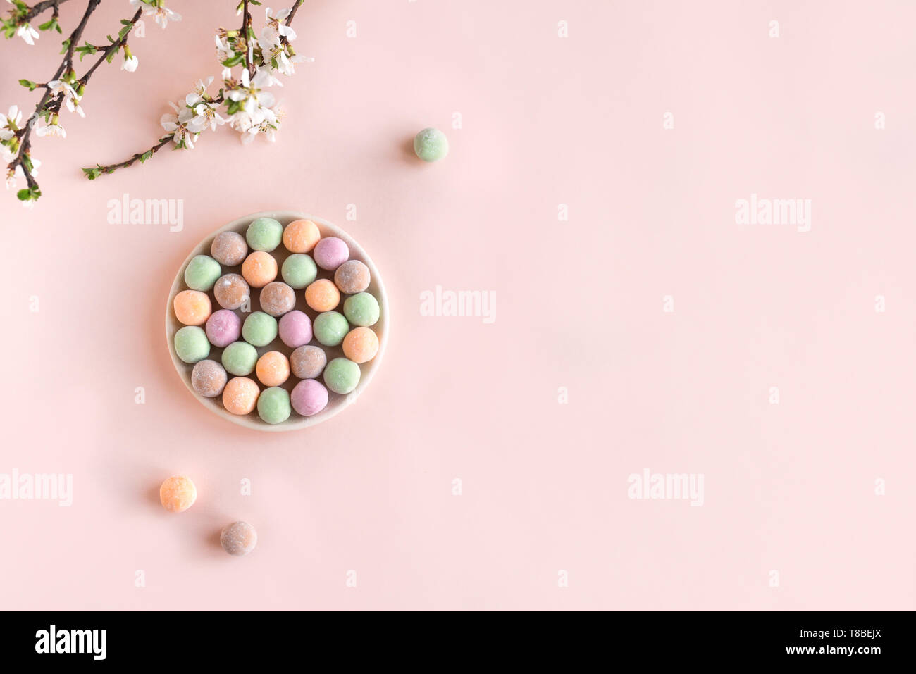 Mini Mochi - traditional japanese dessert on pink pastel background ...