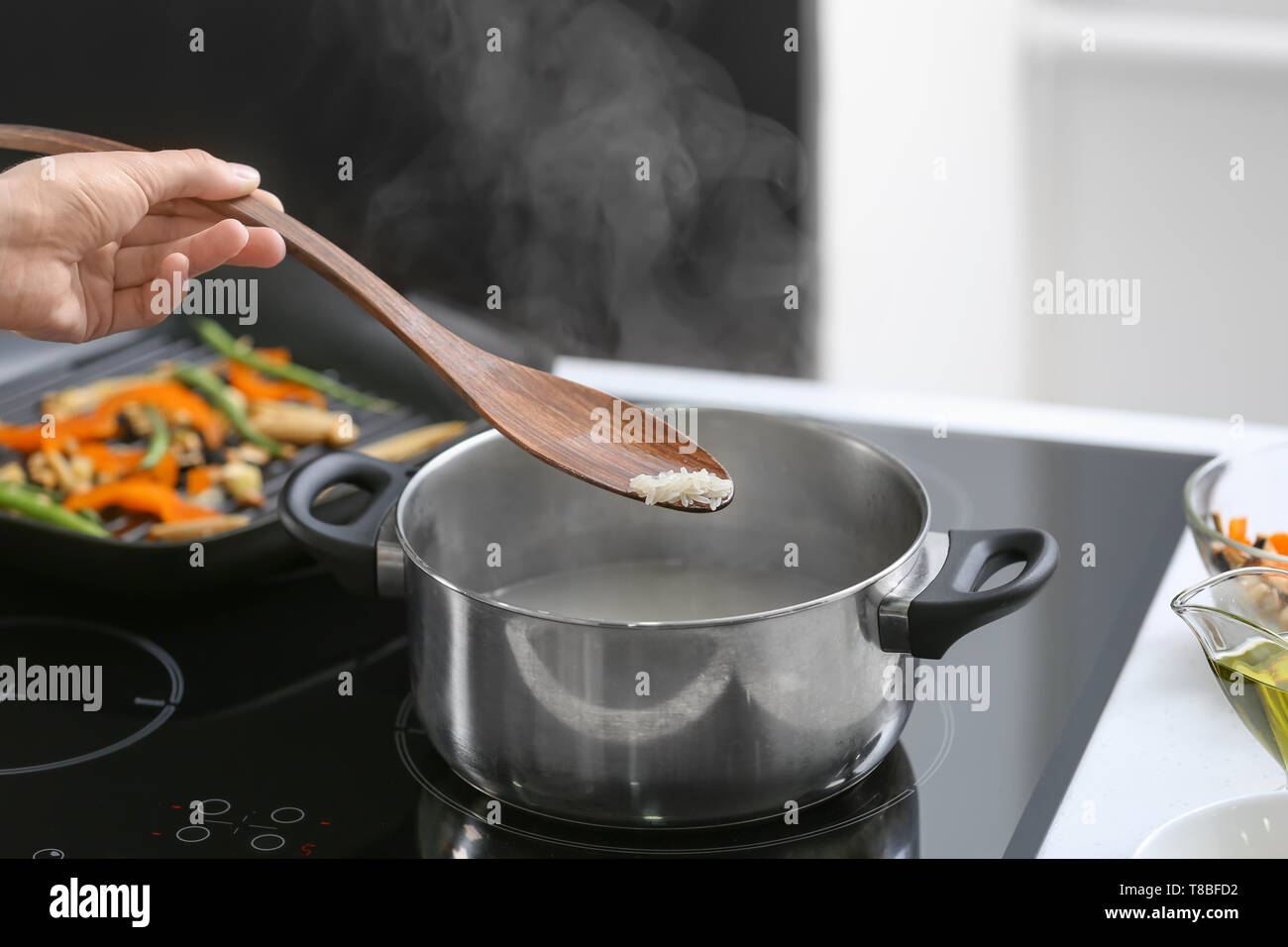 Boiling rice hi-res stock photography and images - Alamy