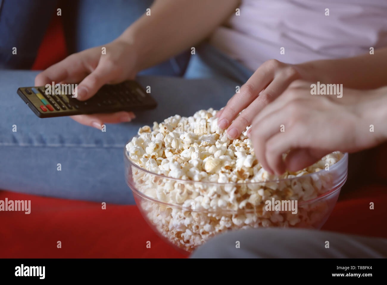Closeup eating popcorn watching movie hi-res stock photography and ...