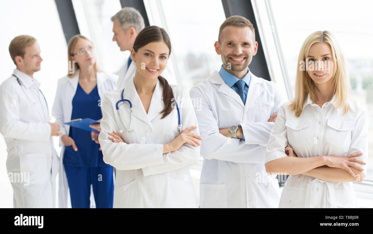 Successful team of medical doctors are looking at camera Stock Photo ...