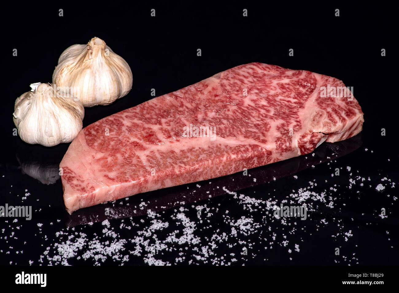 japanese saga beef raw isolated on the black Stock Photo - Alamy