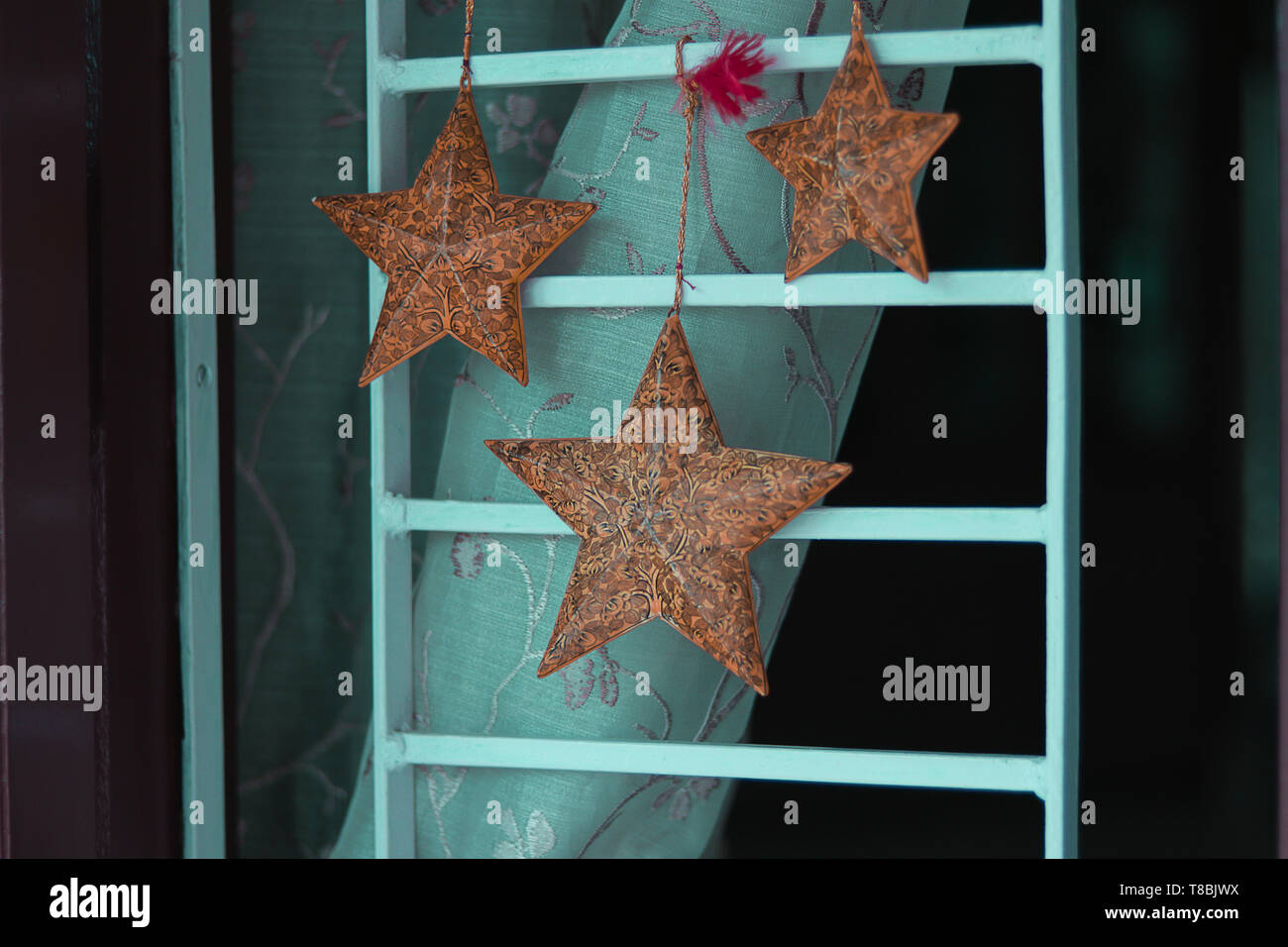 Stars hanging on a window Stock Photo - Alamy