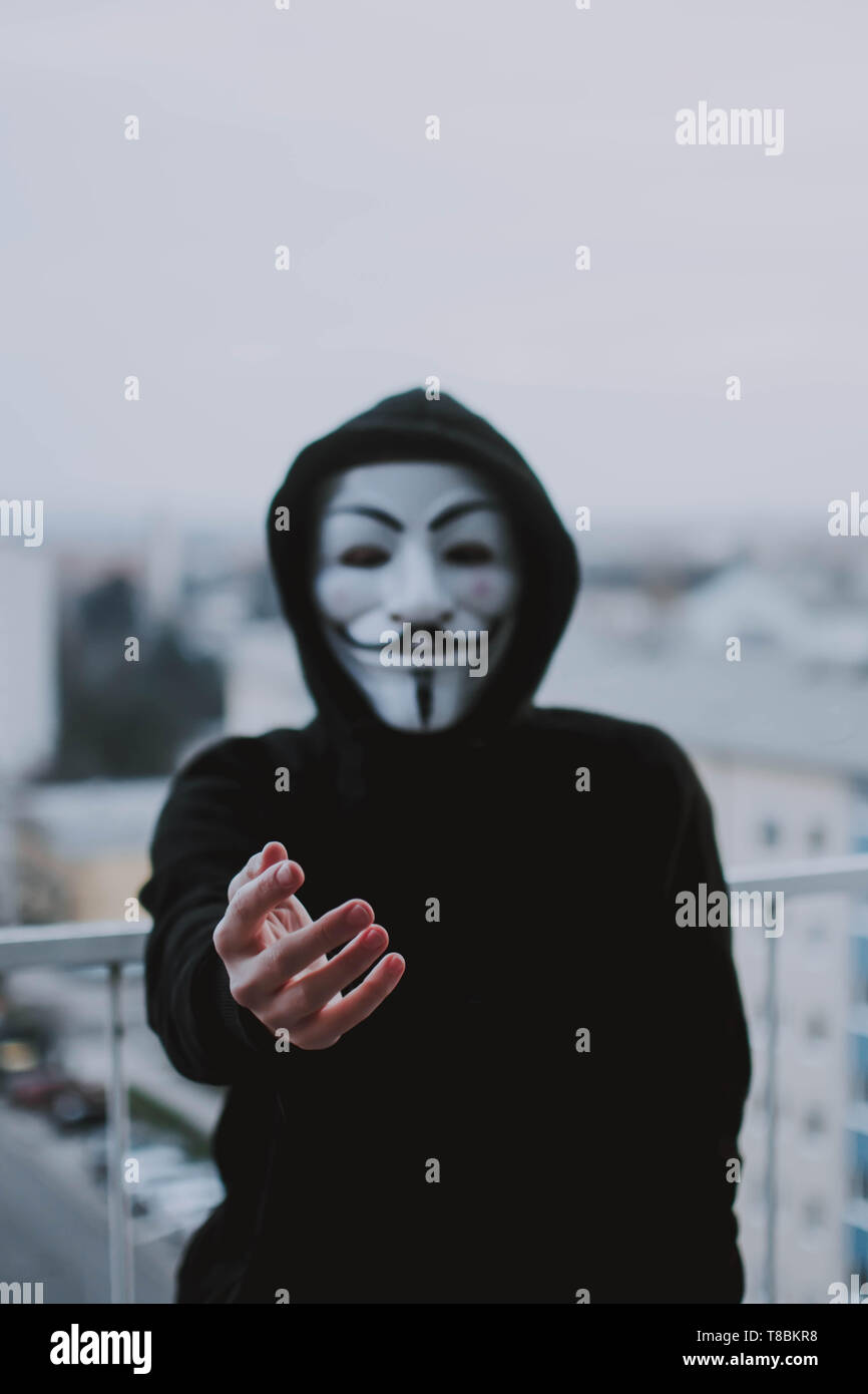 Take a look behind the mask Stock Photo - Alamy