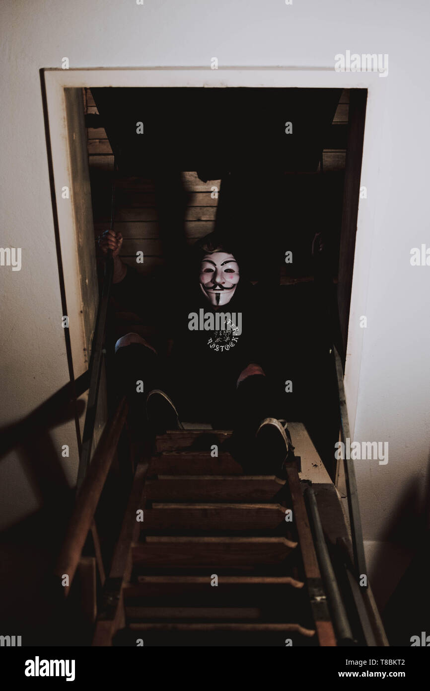 Woman eyes behind mask hi-res stock photography and images - Alamy