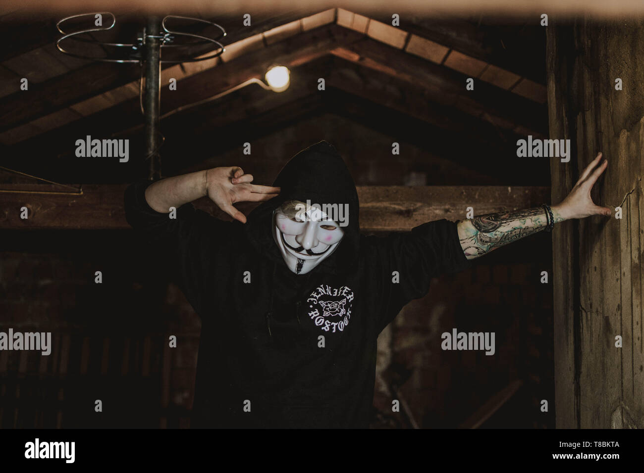 Eyes behind mask hi-res stock photography and images - Alamy