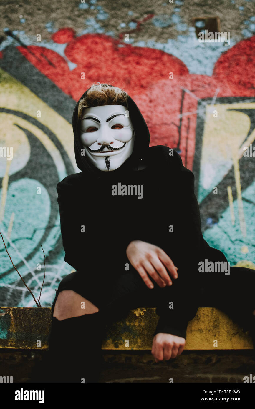 Behind the mask Stock Photo - Alamy