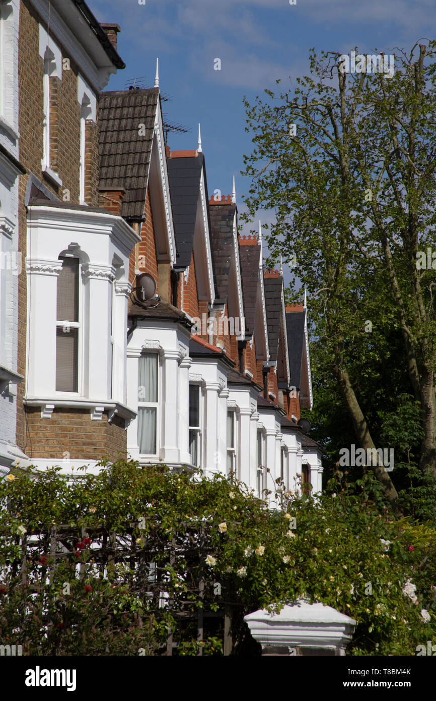 Row of Victorian houses in a west London Street, Chiswick, W4 UK Stock ...