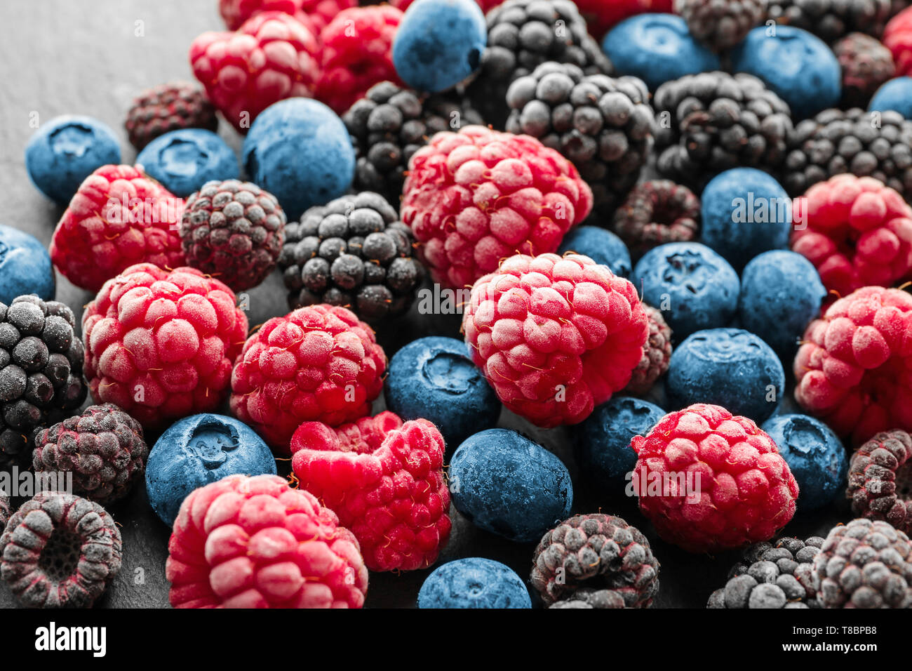 Frozen delicious berries, closeup Stock Photo - Alamy