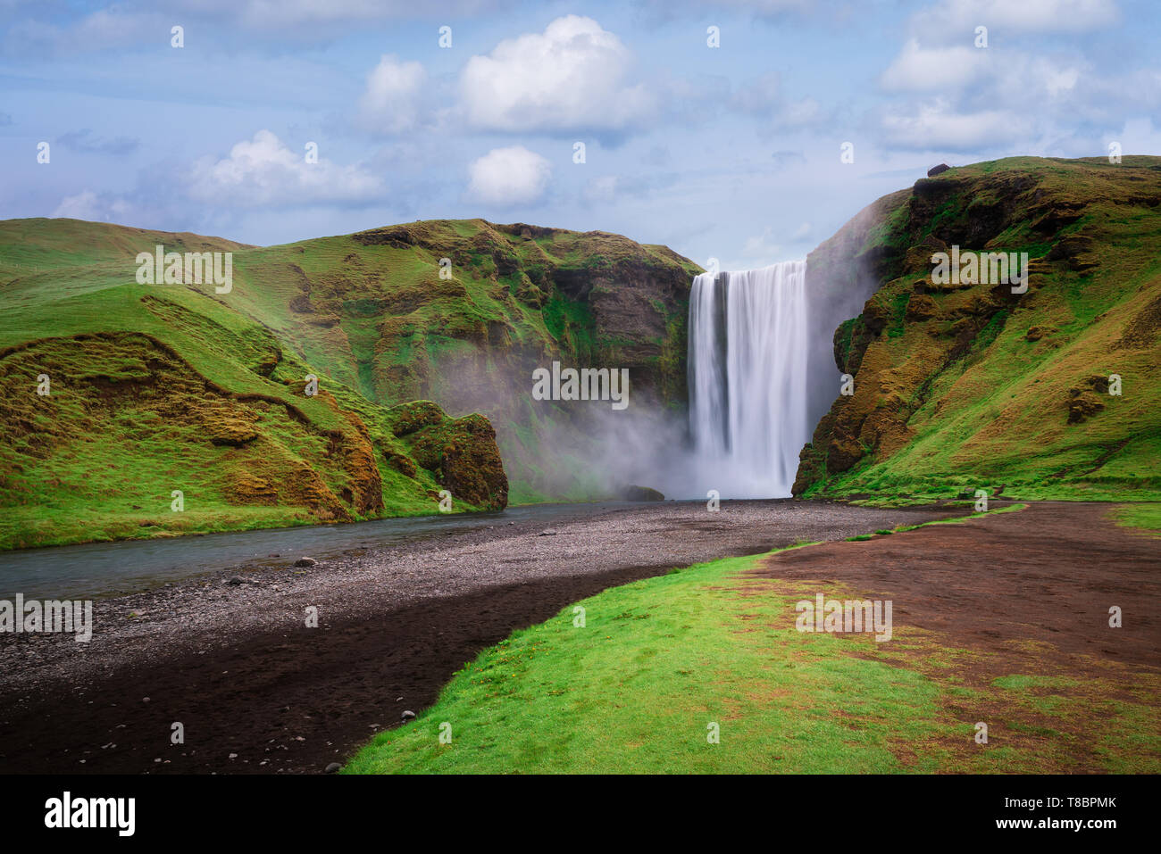 Skogafoss waterfall and Skoga river. Famous landmark of Iceland. Summer ...