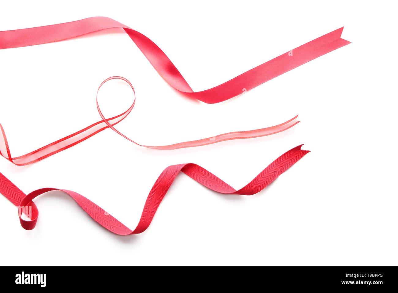 Red ribbons on white background Stock Photo - Alamy