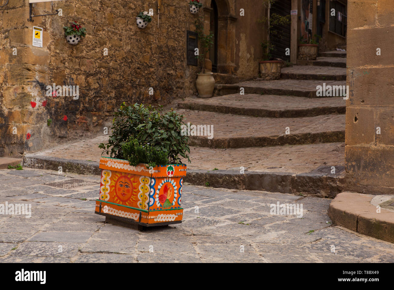 Decorated pot in the alley of Piazza Armerina, Sicily. Italy Stock ...