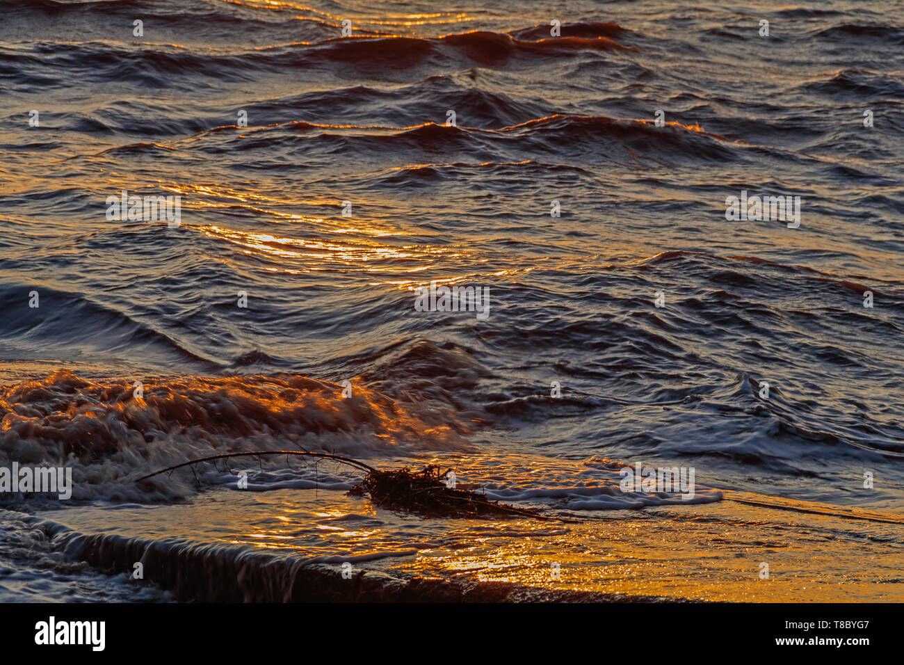 Sea lapping over the slipway Stock Photo - Alamy