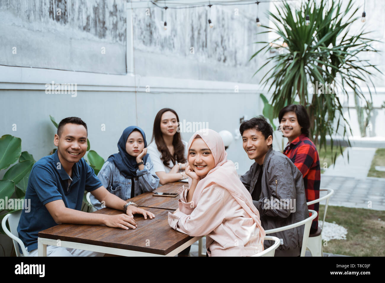 Group of friends office meeting together Stock Photo - Alamy