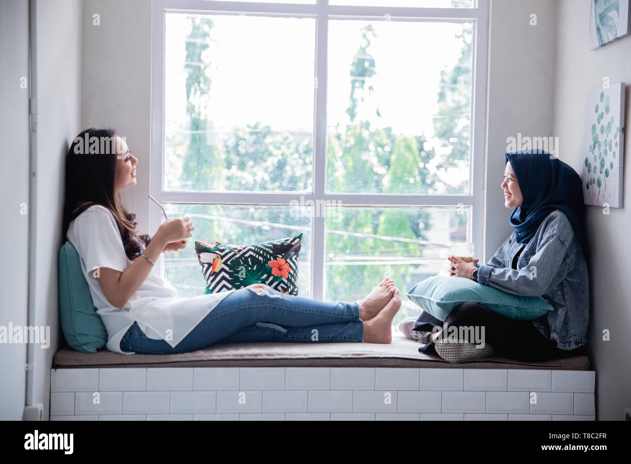 best friends enjoy talking to each other Stock Photo - Alamy