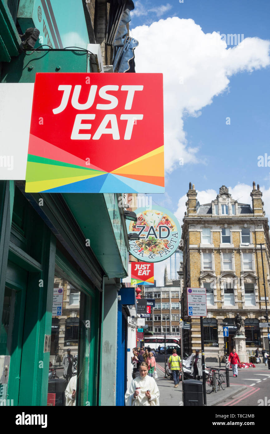 Just Eat signage on Borough High Street, Southwark, London, UK Stock ...