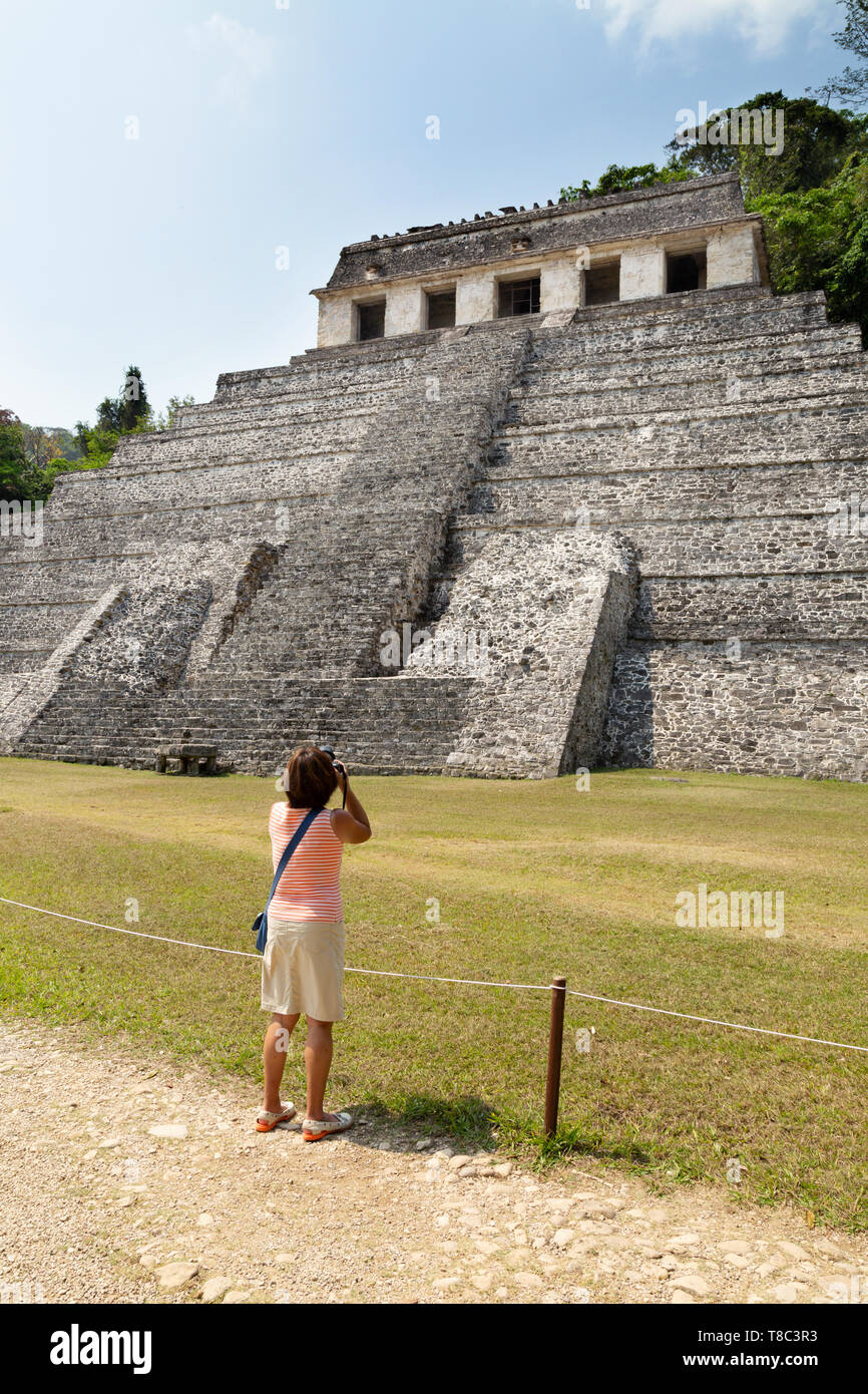 Palenque temple - woman tourist taking a photo of the Temple of ...