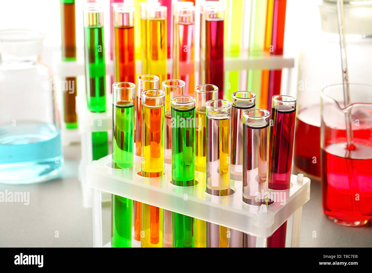 Test tubes with colorful samples in laboratory, closeup Stock Photo - Alamy