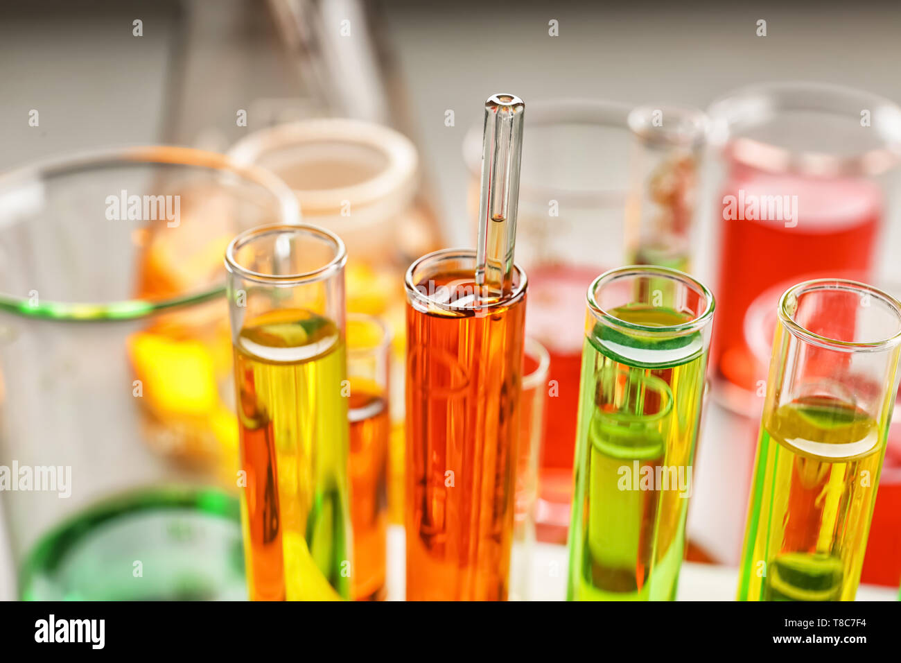 Test tubes with colorful samples in laboratory, closeup Stock Photo - Alamy