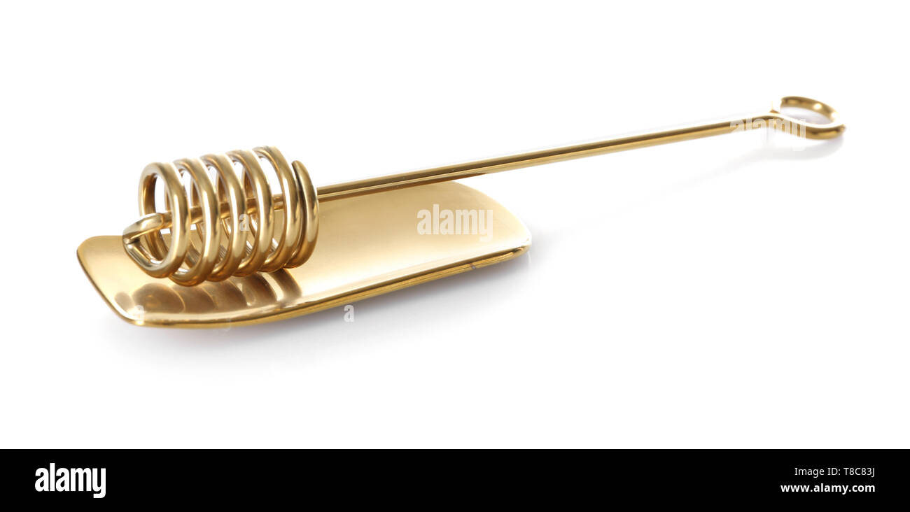 Golden honey dipper on white background Stock Photo - Alamy
