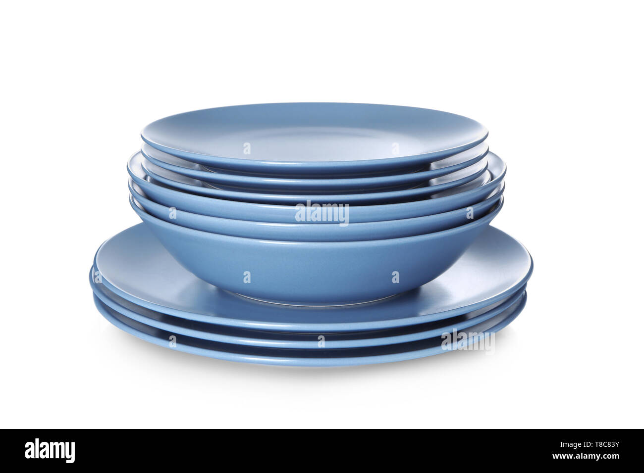 Set of clean plates on white background Stock Photo - Alamy