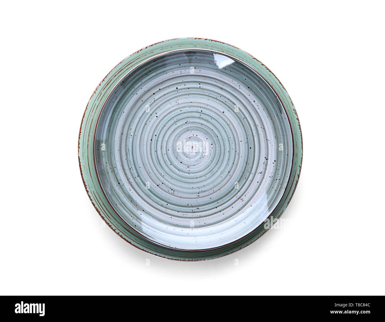 Clean plates on white background Stock Photo - Alamy