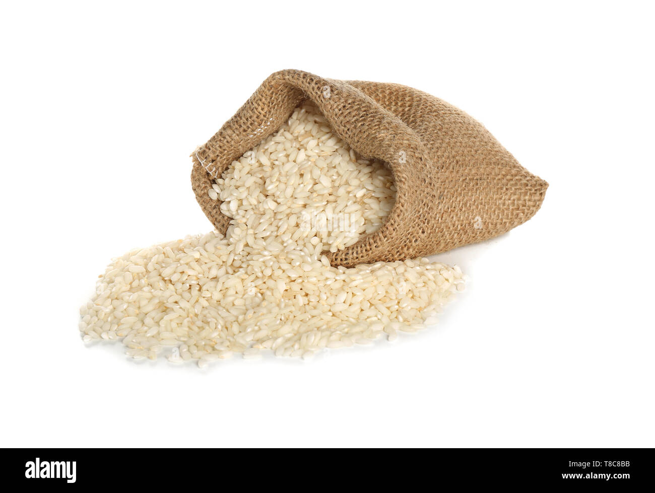 Bag with raw rice on white background Stock Photo - Alamy