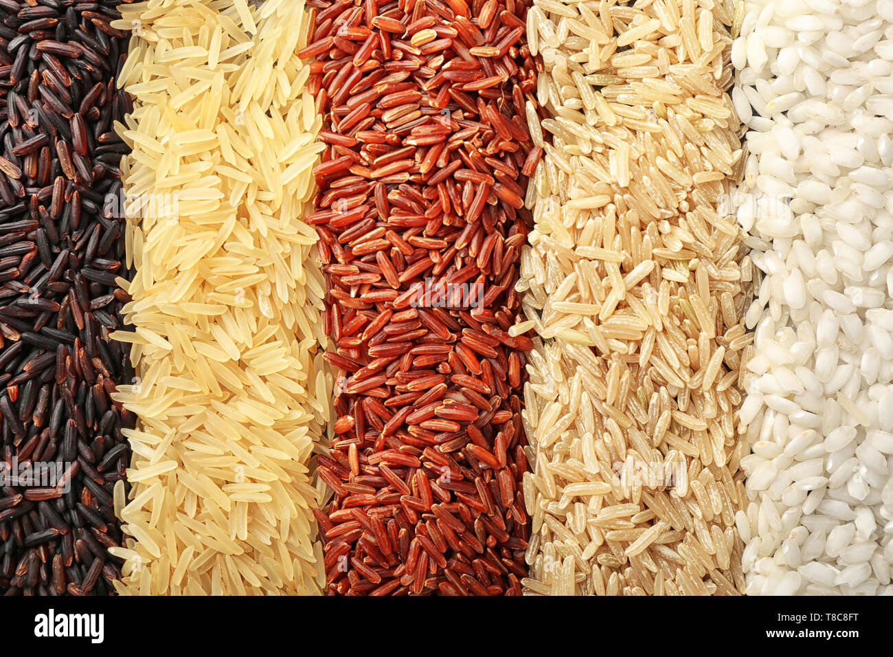 Different types of rice as background, closeup Stock Photo - Alamy