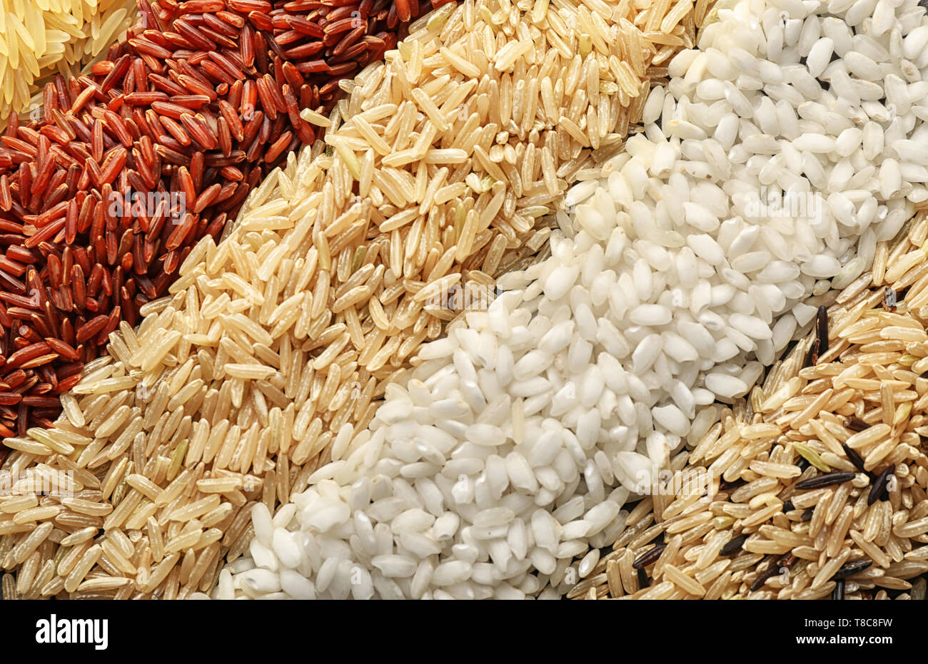 Different types of rice as background, closeup Stock Photo - Alamy