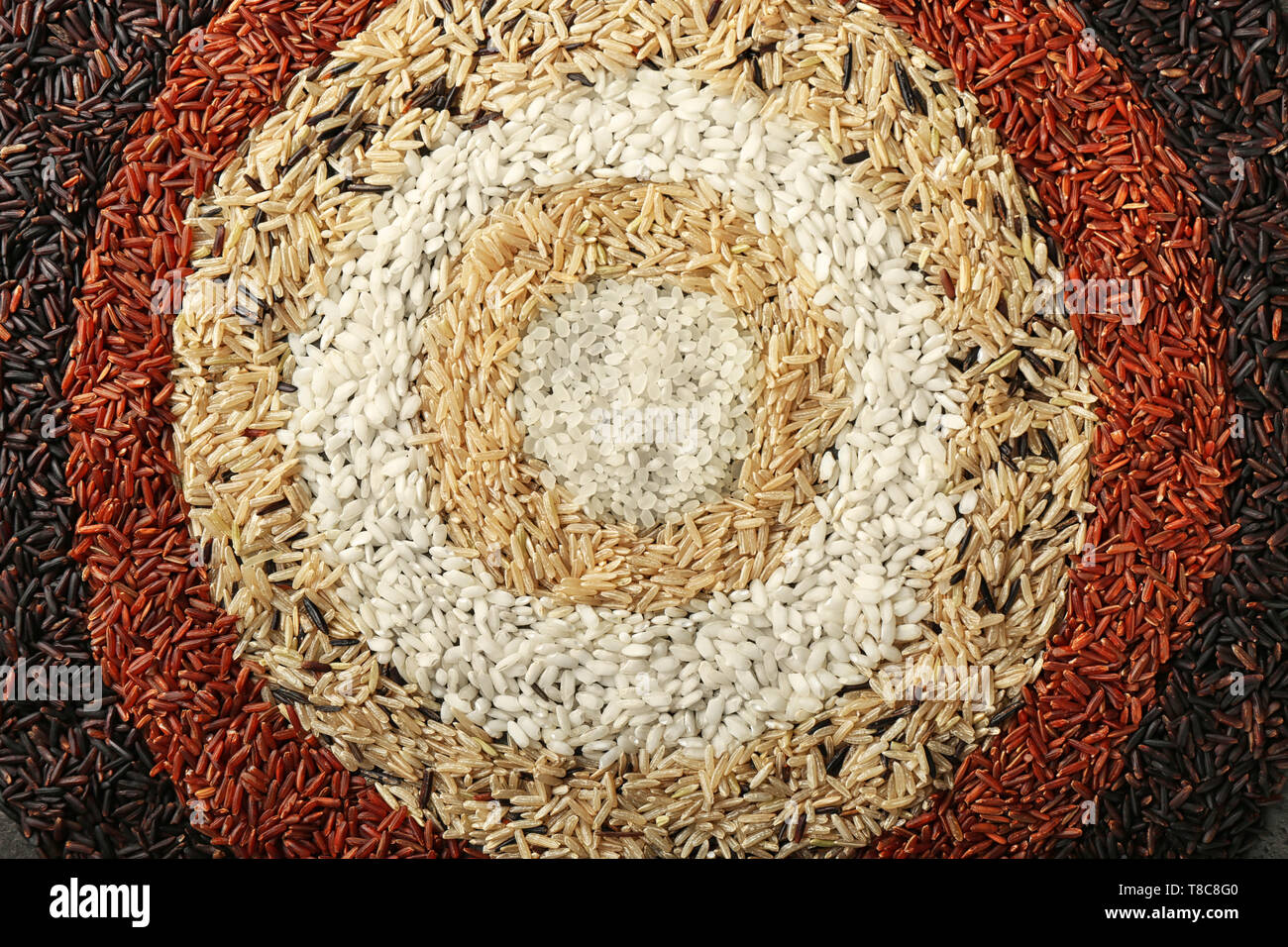 Composition with different types of rice, closeup Stock Photo - Alamy