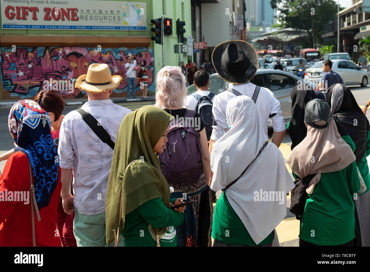 Tourists and locals on city street in Kuala Lumpur, Malaysia Stock ...
