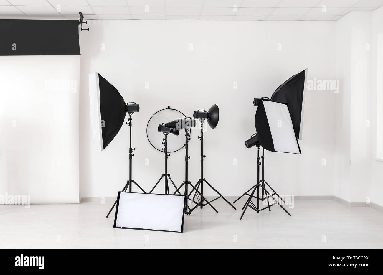 Interior of modern photo studio with professional equipment Stock Photo ...