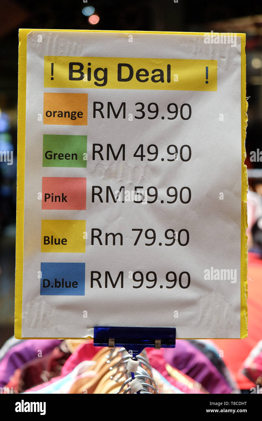 Discount sign on clothing in the Central Market in Kuala Lumpur ...