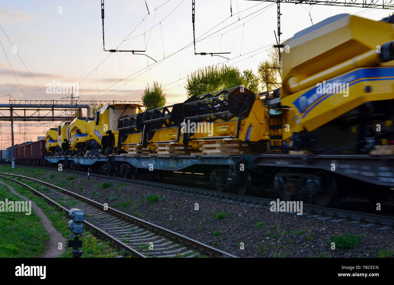 Transporting combine harvesters by rail. Cargo transportation by ...