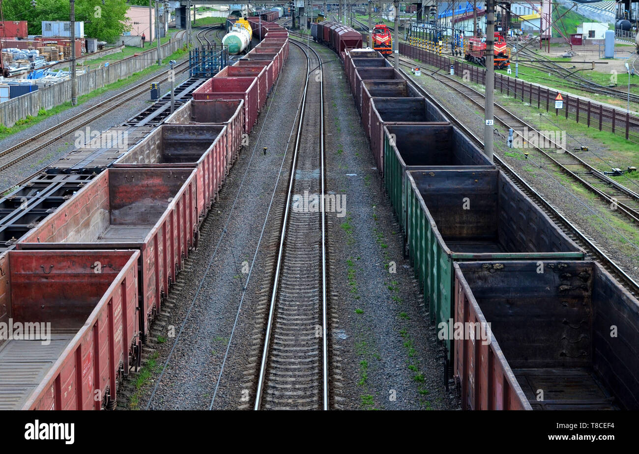 Cargo transportation by railway, sorting freight railway station Stock ...