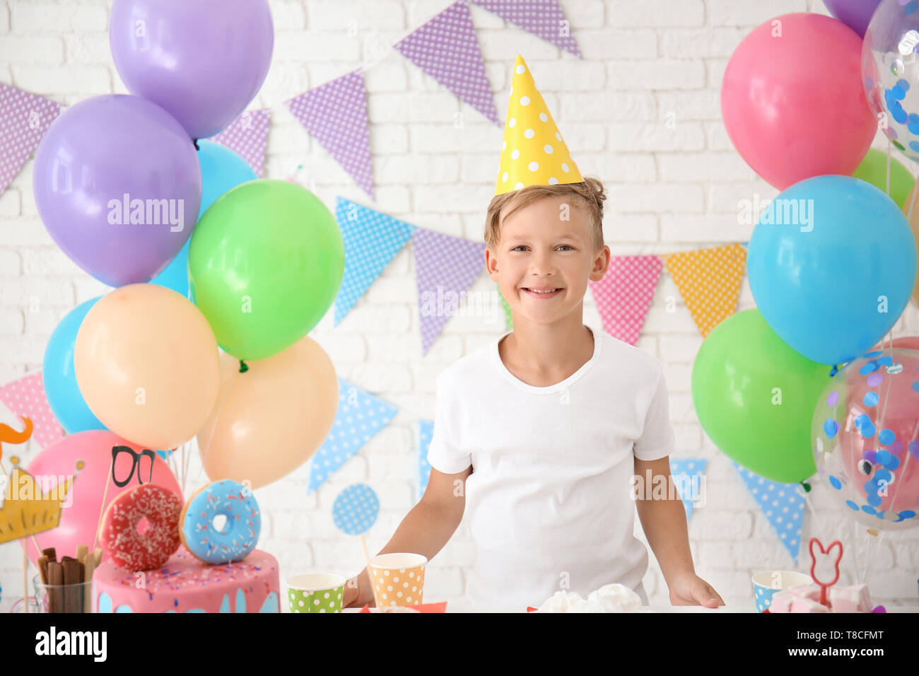 Cute little boy celebrating Birthday at home Stock Photo - Alamy