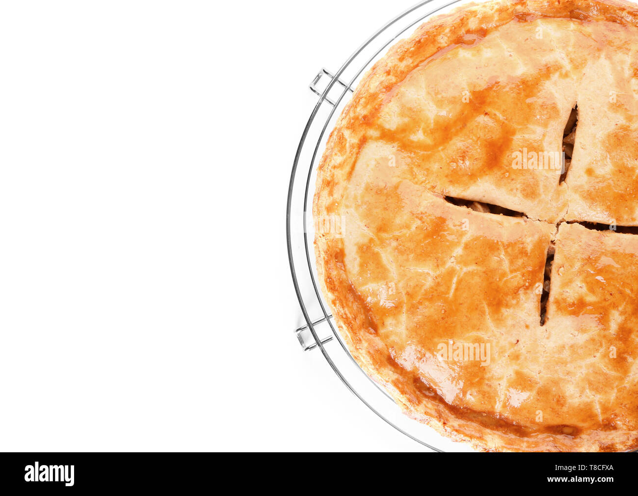 Cooling rack with delicious apple pie on white background Stock Photo ...
