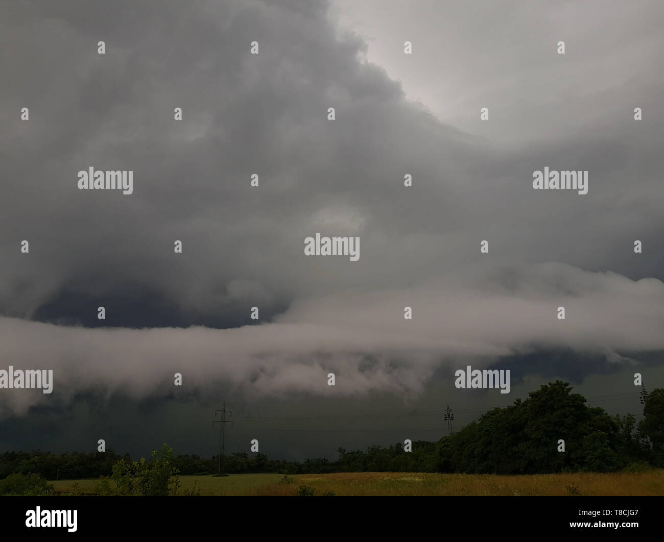 Landscape with threatening storm clouds Stock Photo - Alamy
