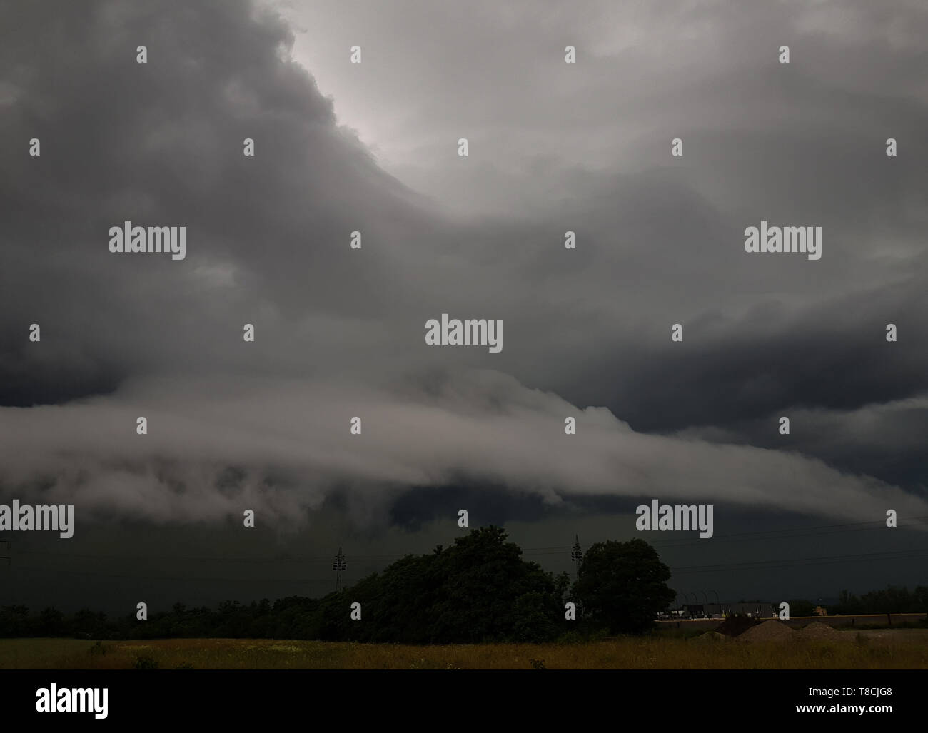 Landscape with threatening storm clouds Stock Photo - Alamy