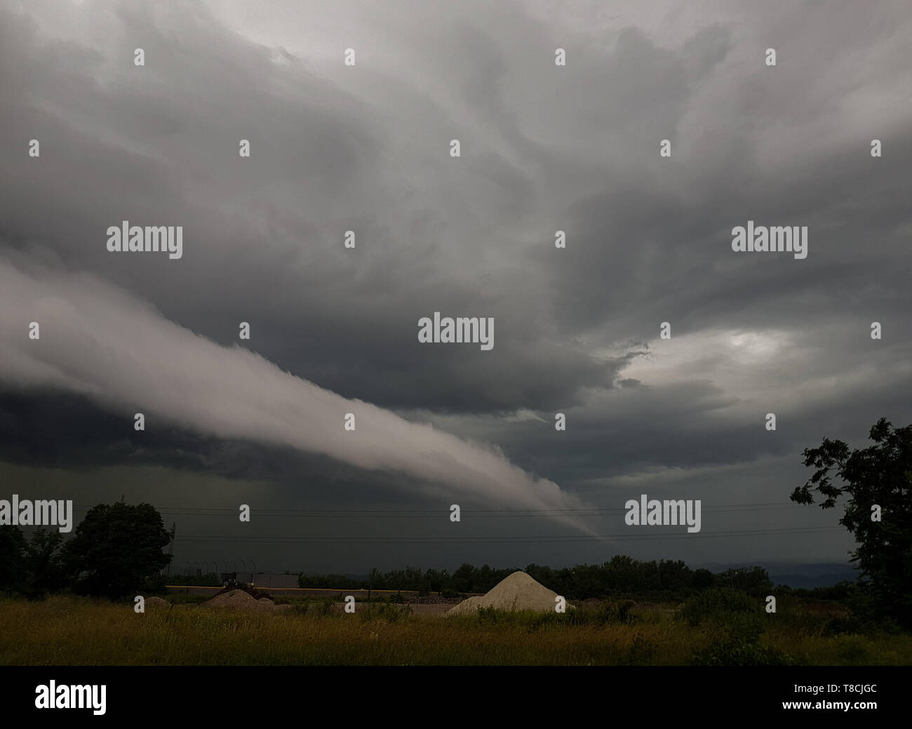 Landscape with threatening storm clouds Stock Photo - Alamy