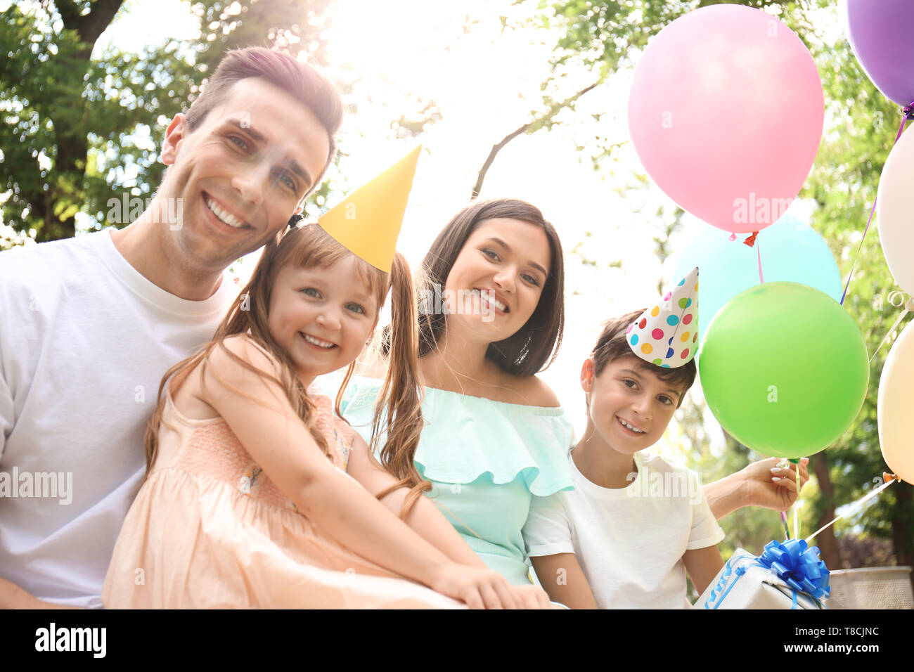 Happy family at birthday party outdoors Stock Photo - Alamy