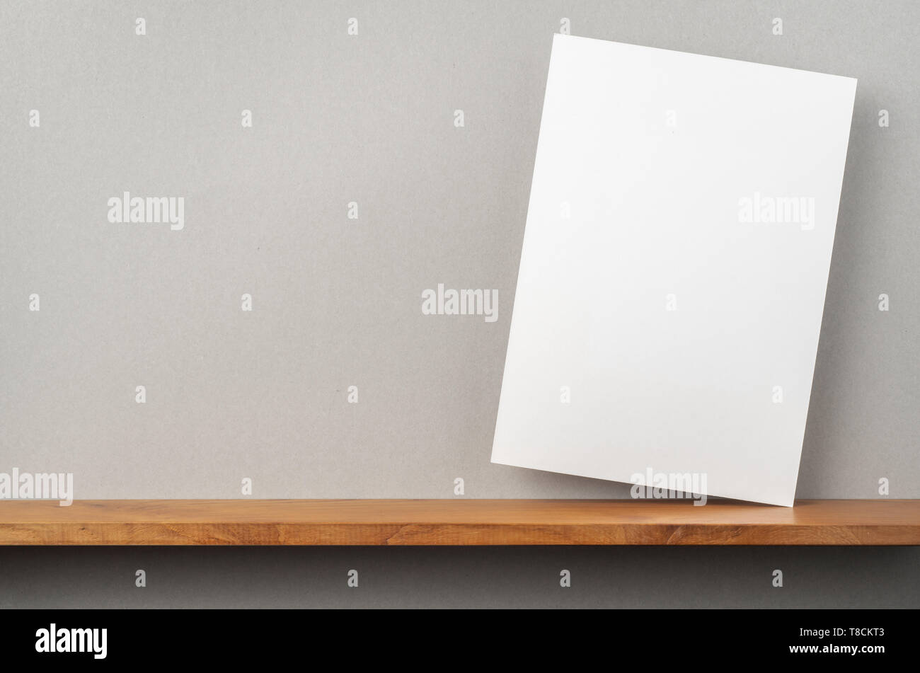 Design concept - front view of A4 hard paper stand on bookshelf and ...