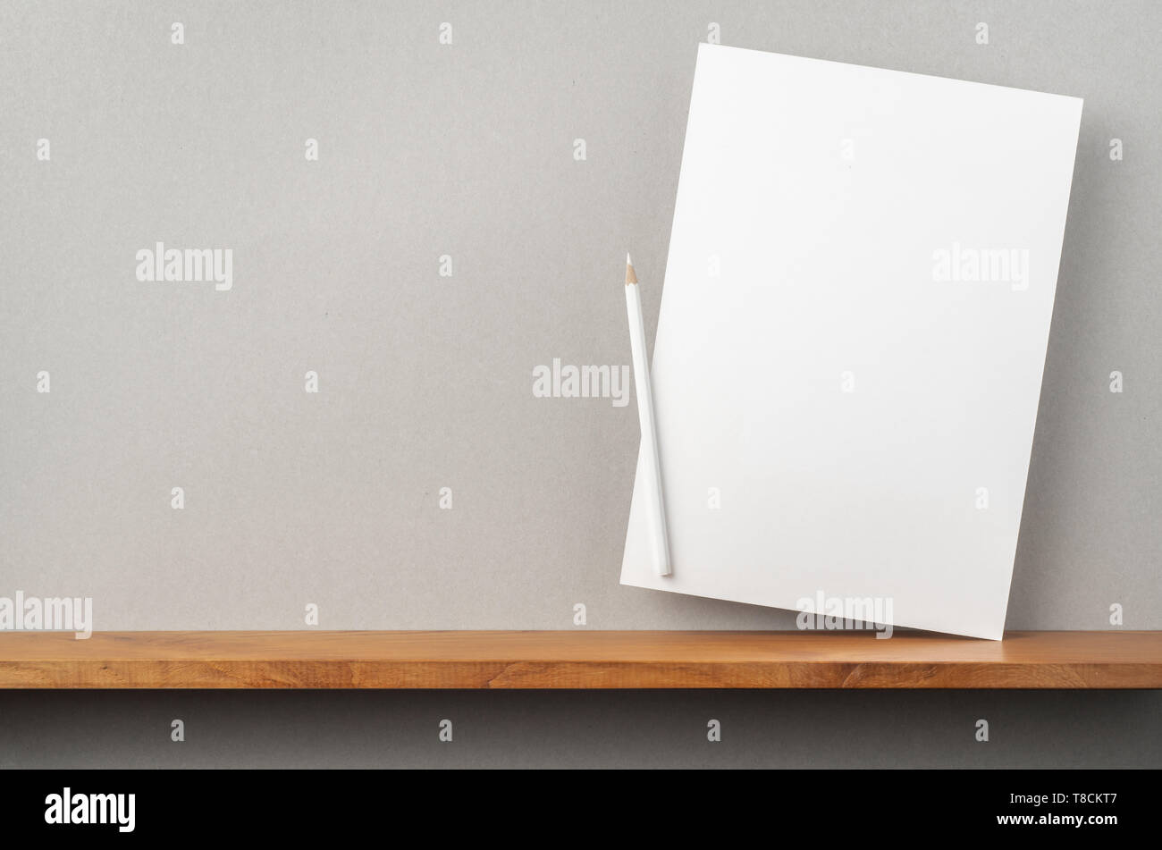 Design concept - front view of A4 hard paper stand on bookshelf and ...