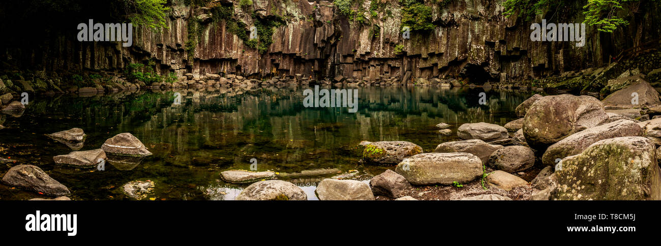 panorama landscape view with natoral pool and rocks on the water, Jeju ...
