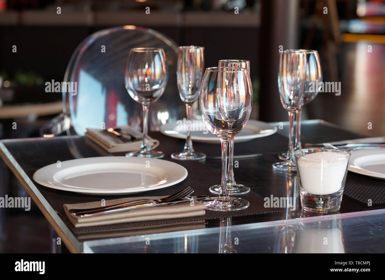 Table setting in a restaurant Stock Photo - Alamy